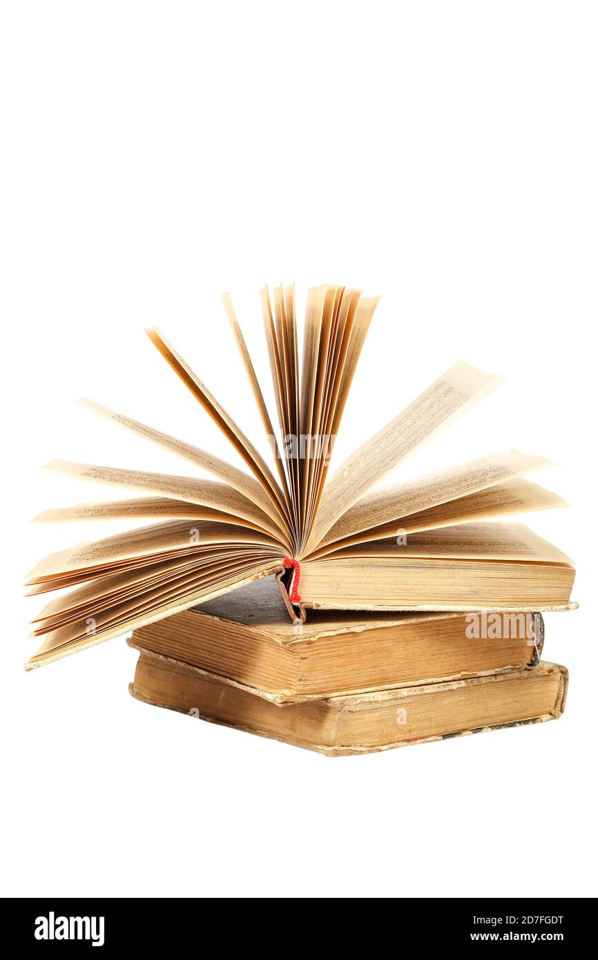 Books pile isolated on a white background Stock Photo - Alamy