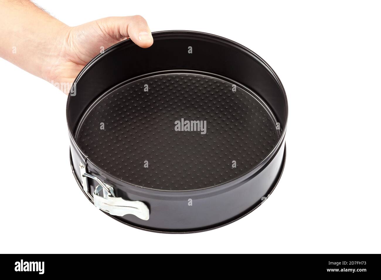 Baking dish in hand isolated on white background Stock Photo - Alamy