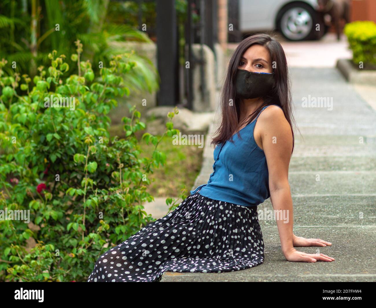 Adult woman dark hair sits hi-res stock photography and images - Alamy
