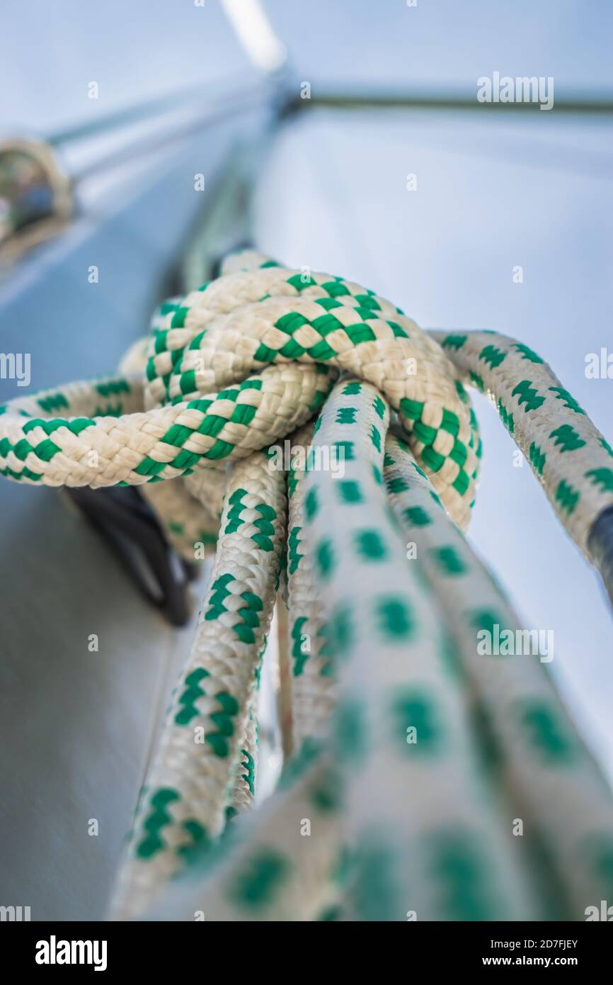 closeup of a green rope tied to a sailboat mast Stock Photo - Alamy