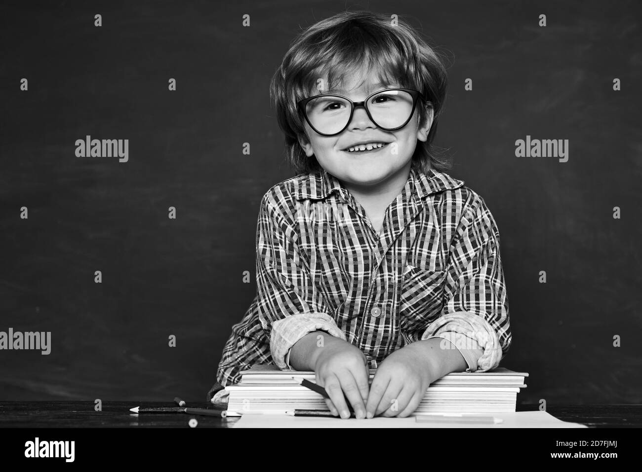 Blackboard background. Little children at school lesson. Kids from ...