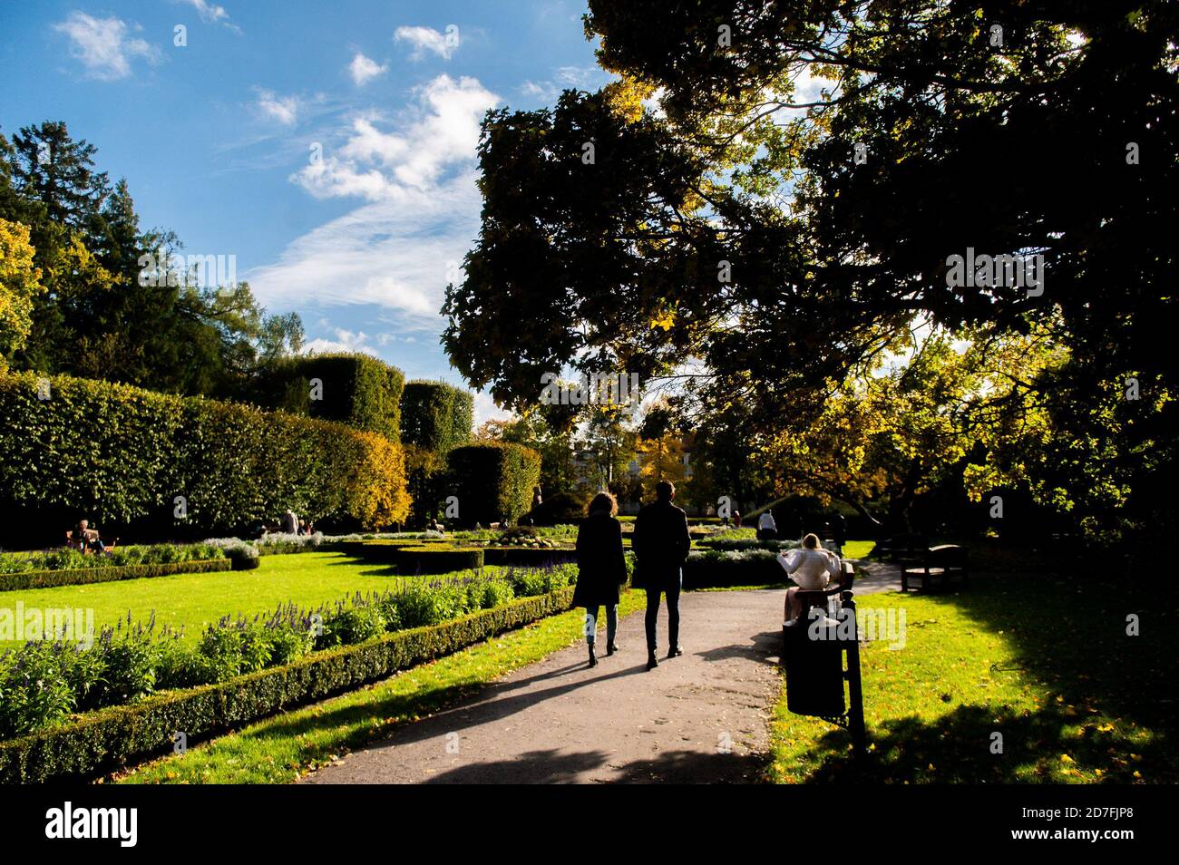 A couple is seen taking a walk at Oliwski Park in Gdansk Stock Photo ...