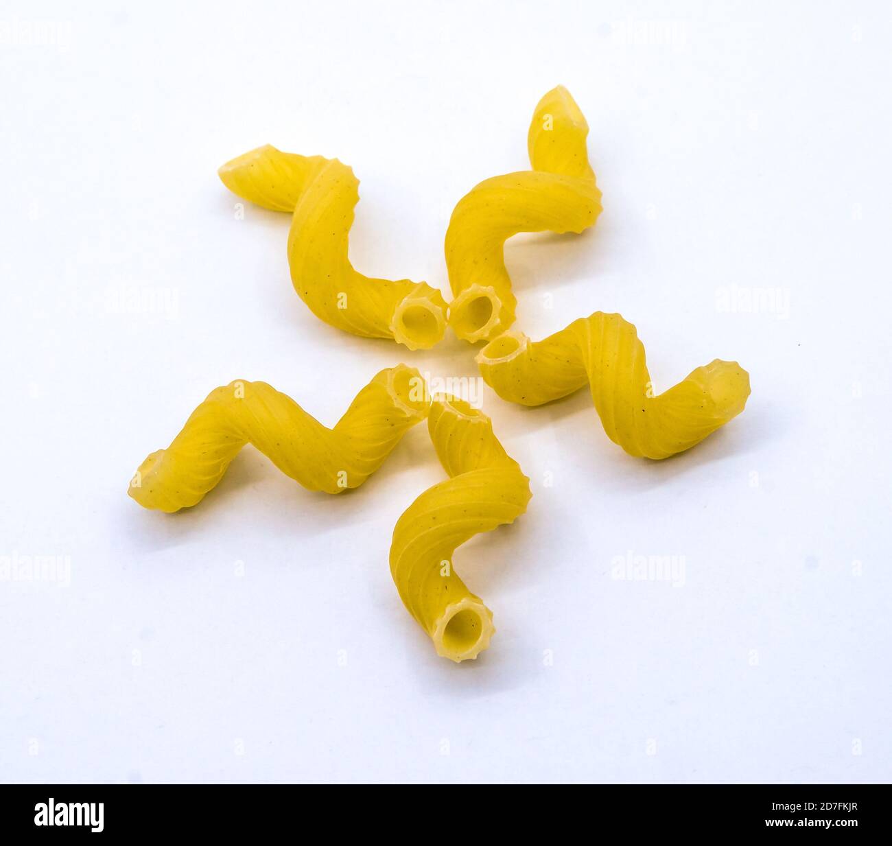 spiral macaroni, macaroni patterns, swirls of macaroni on a white ...