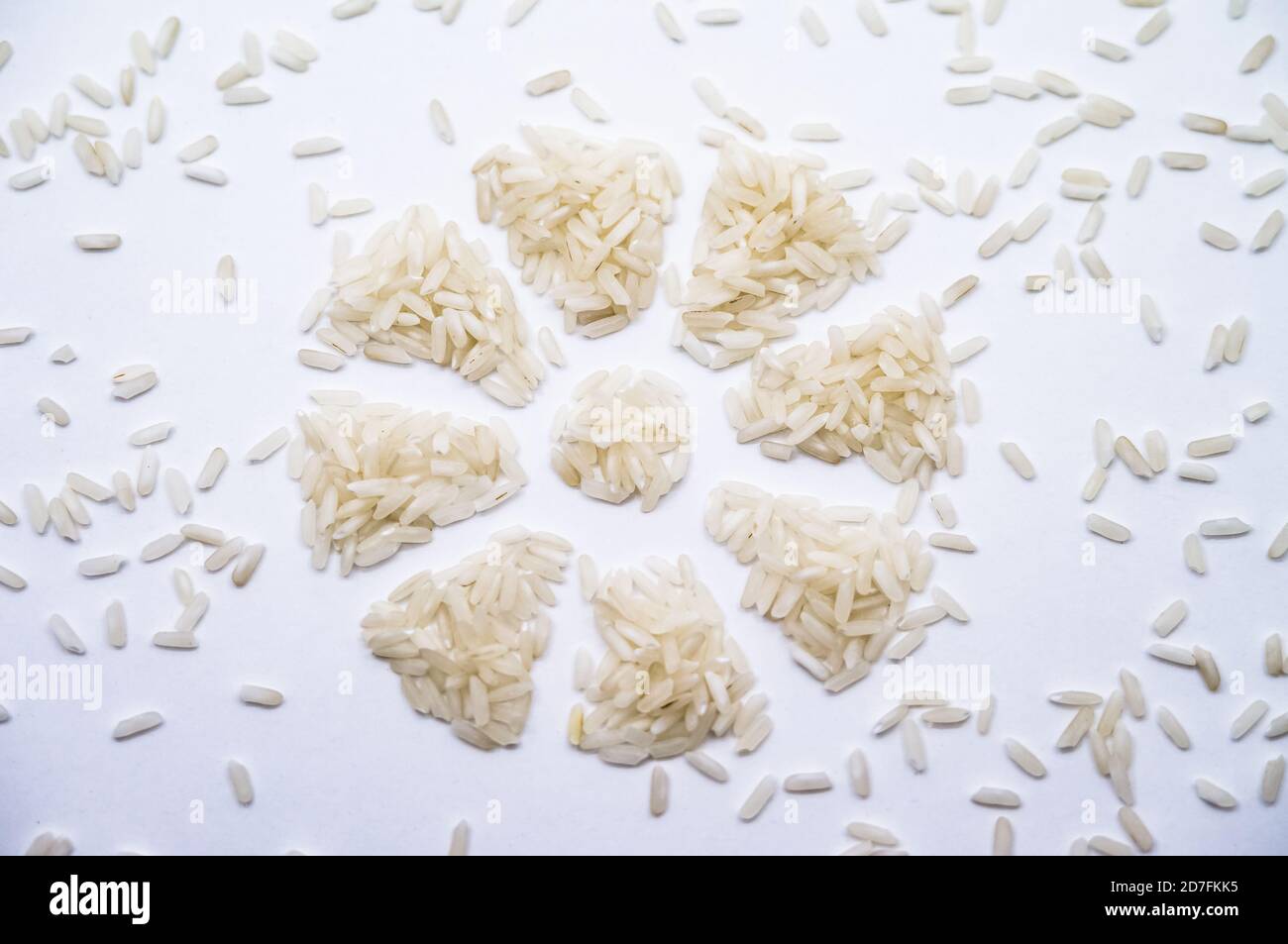 rice grits on a white background, rice porridge, snowflake from rice ...