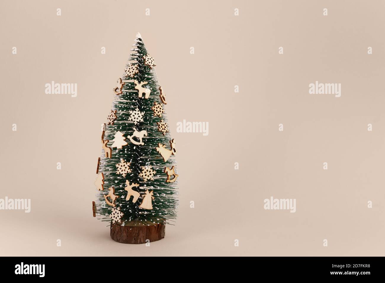 Zero waste Christmas tree on elegant biege background. Minimal concept ...