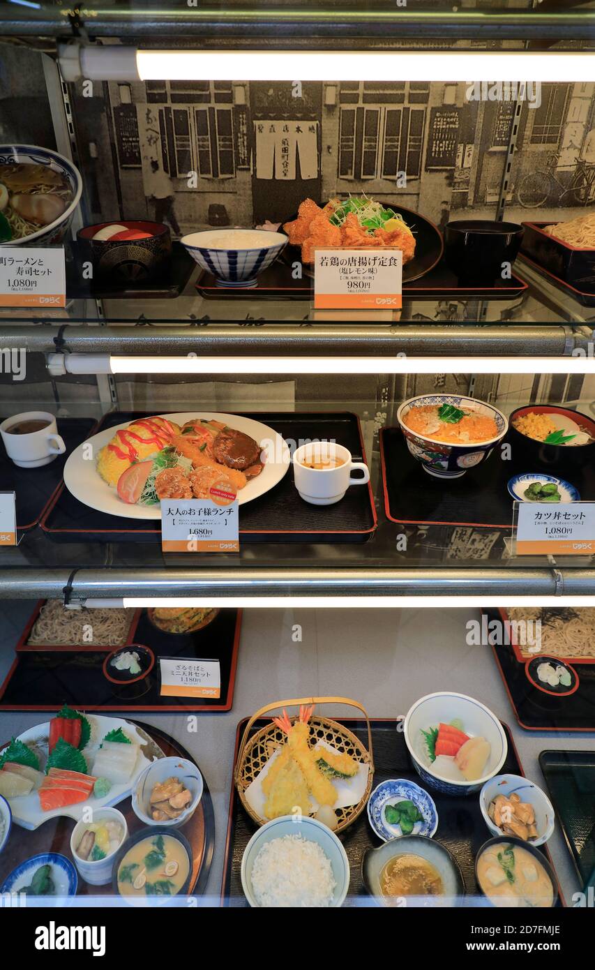 Plastic food replica with price tags displaying outside of a restaurant ...