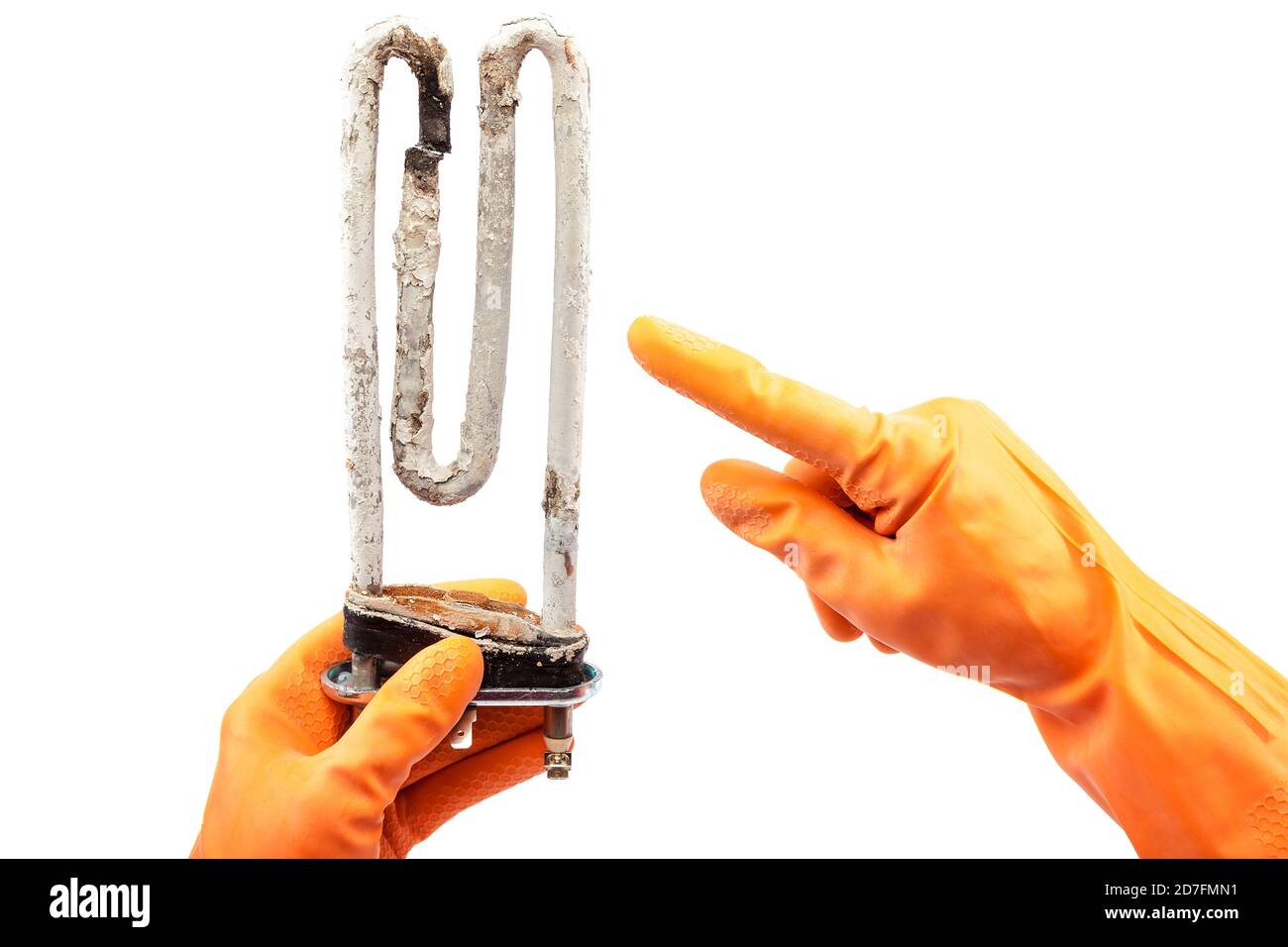 Damaged heating element of the washing machine in hand isolated on ...