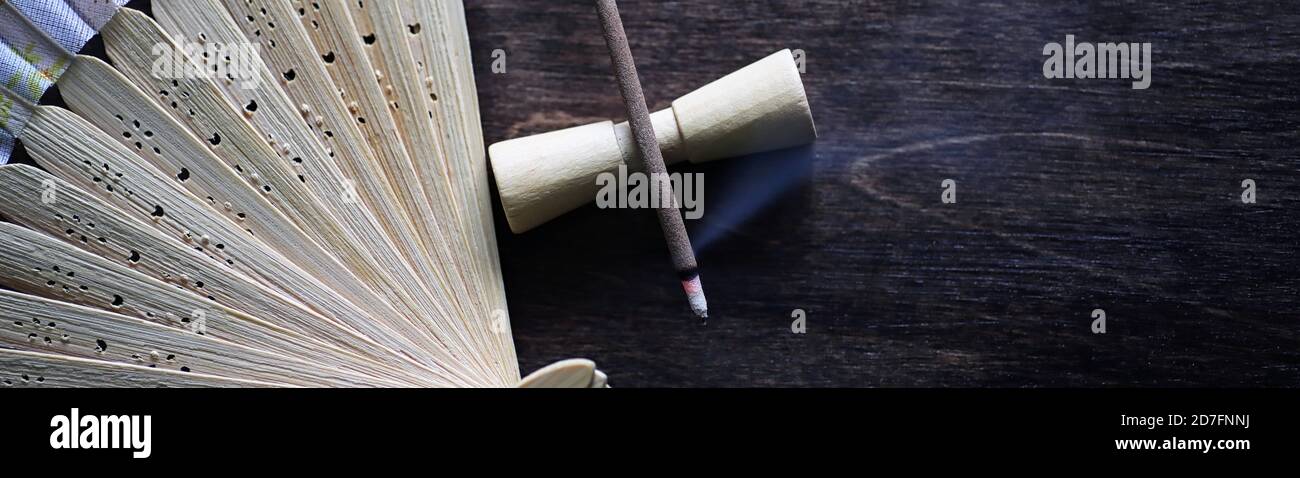 Different objects with traditional religious oriental on a wooden ...
