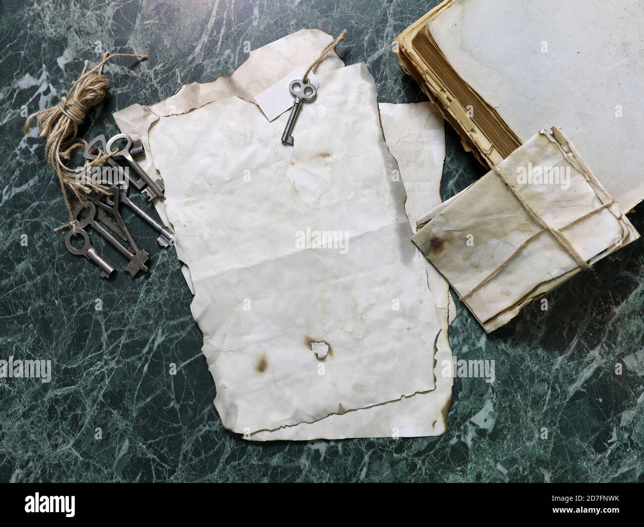 retro papers and book on detective work table with tools background ...