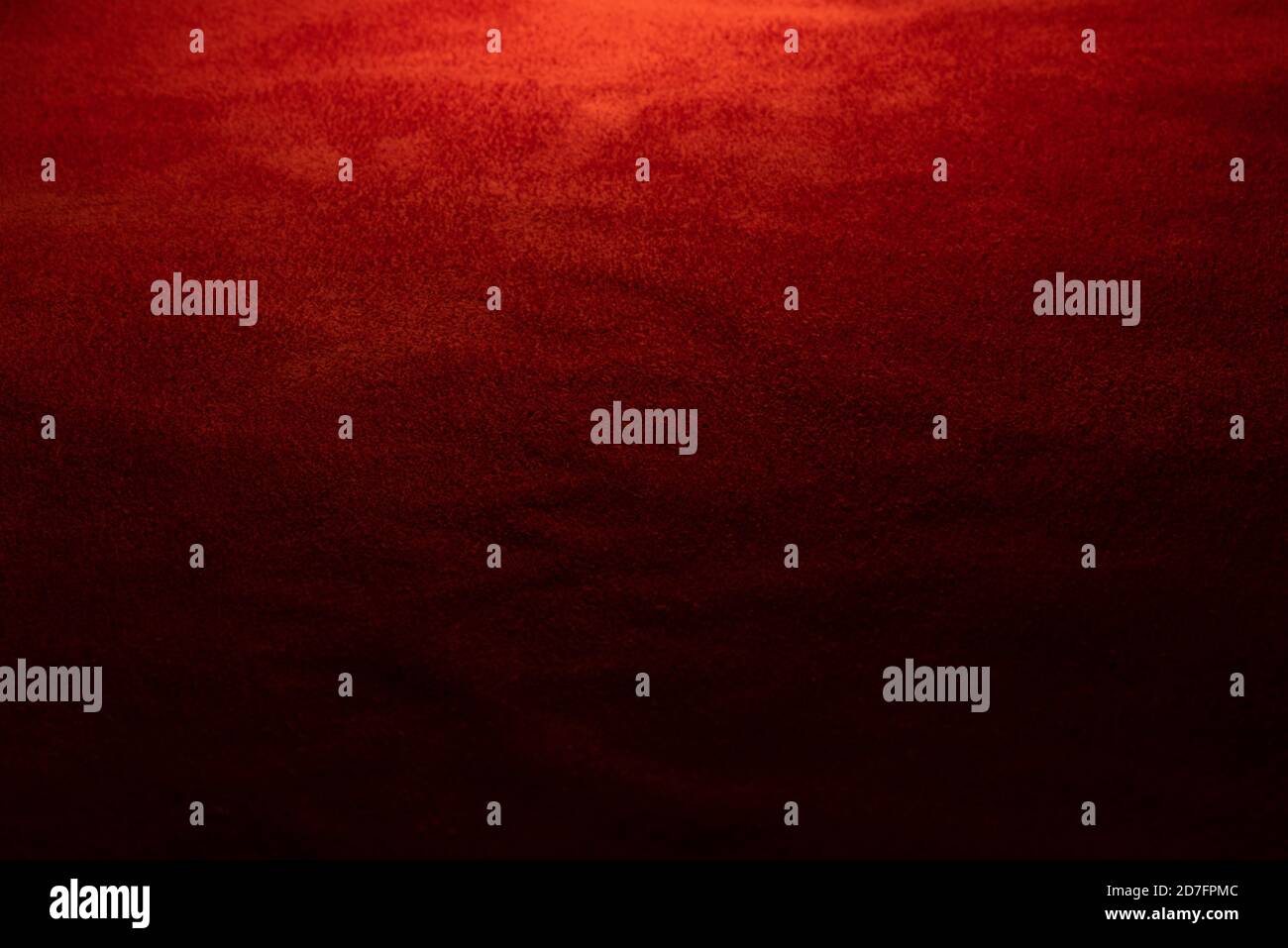 Red matte background of suede fabric, closeup. Velvet texture of ...