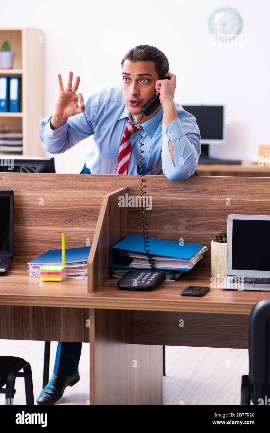 Male employee in industrial espionage concept Stock Photo - Alamy