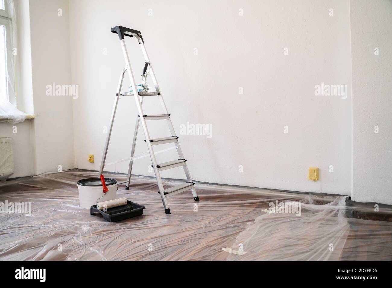 House Wall Paint Inside. Maintenance Painting Service Stock Photo - Alamy