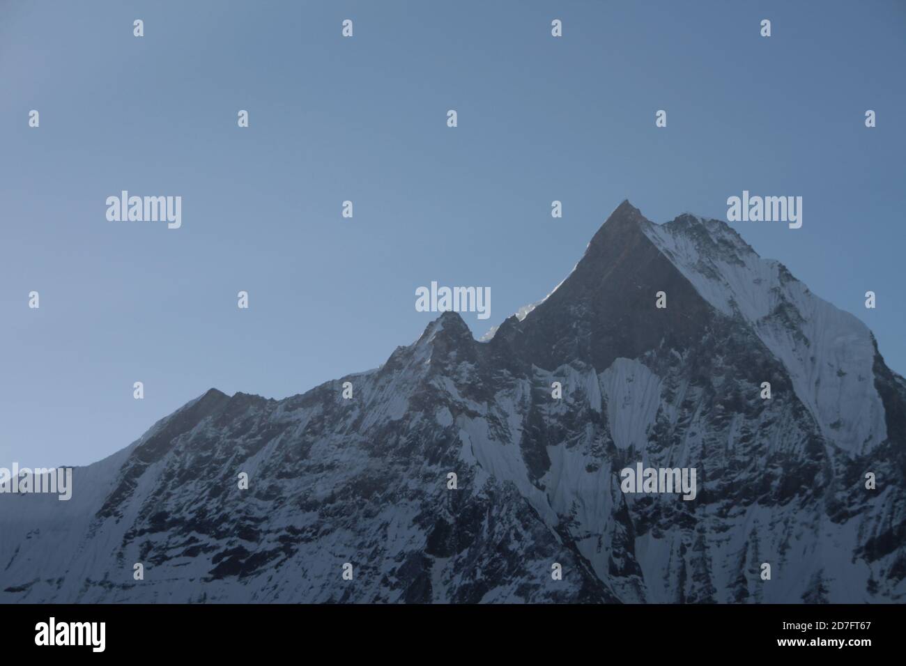 Majestic shot of a jagged rocky peak of an Annapurna mountain range in ...