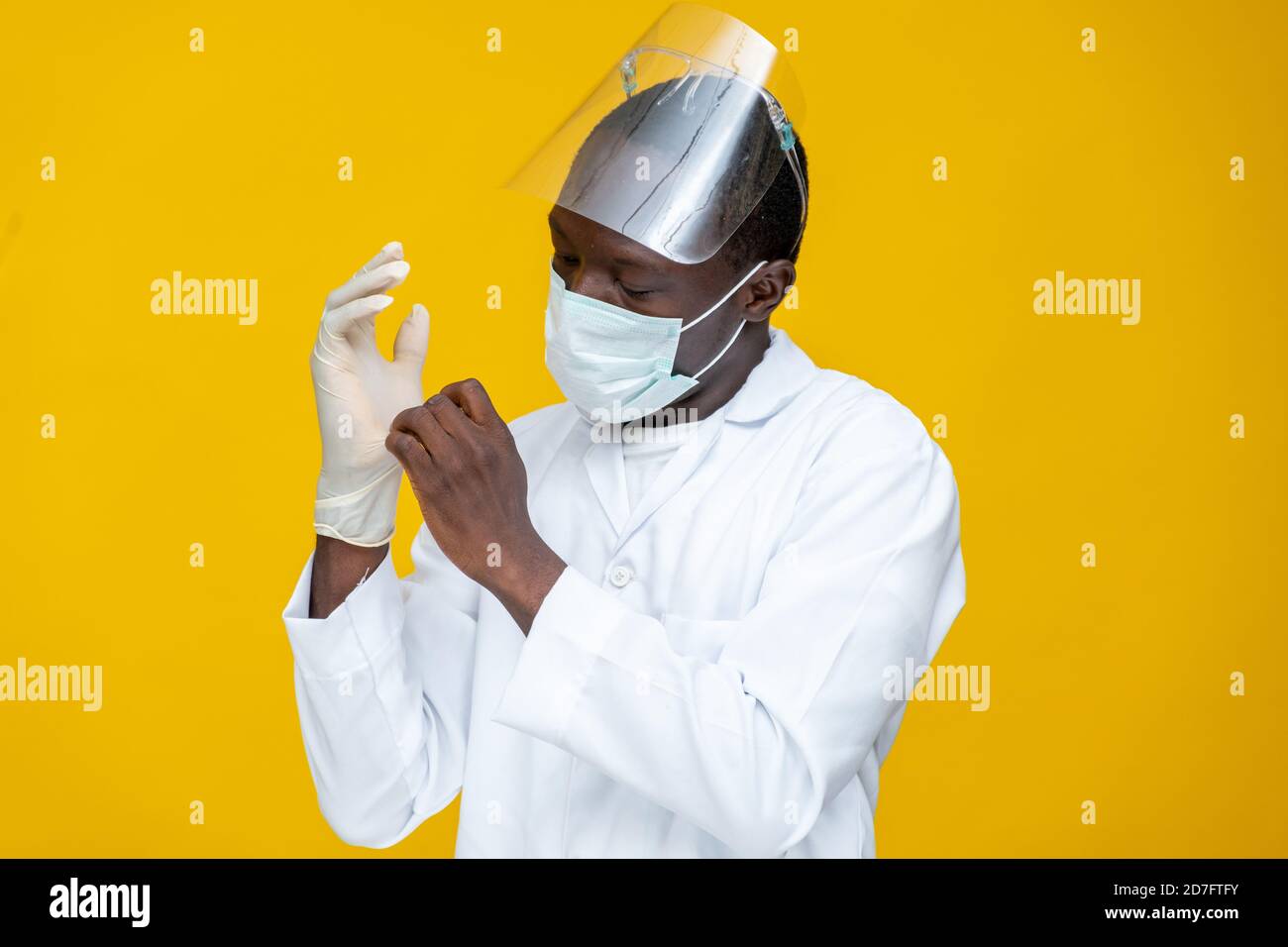 african medical personnel wearing lab coat, face mask and shield ...