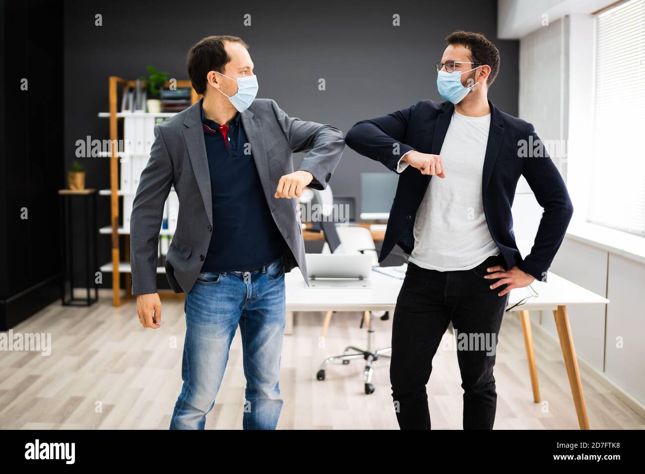 Office Employee At Work With Face Work To Stop Covid Stock Photo - Alamy