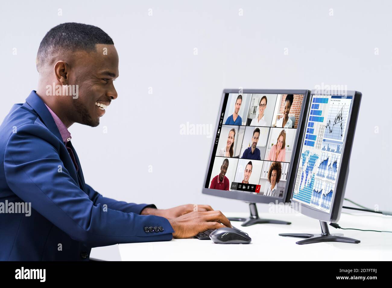 Man having video conference multiple hi-res stock photography and ...