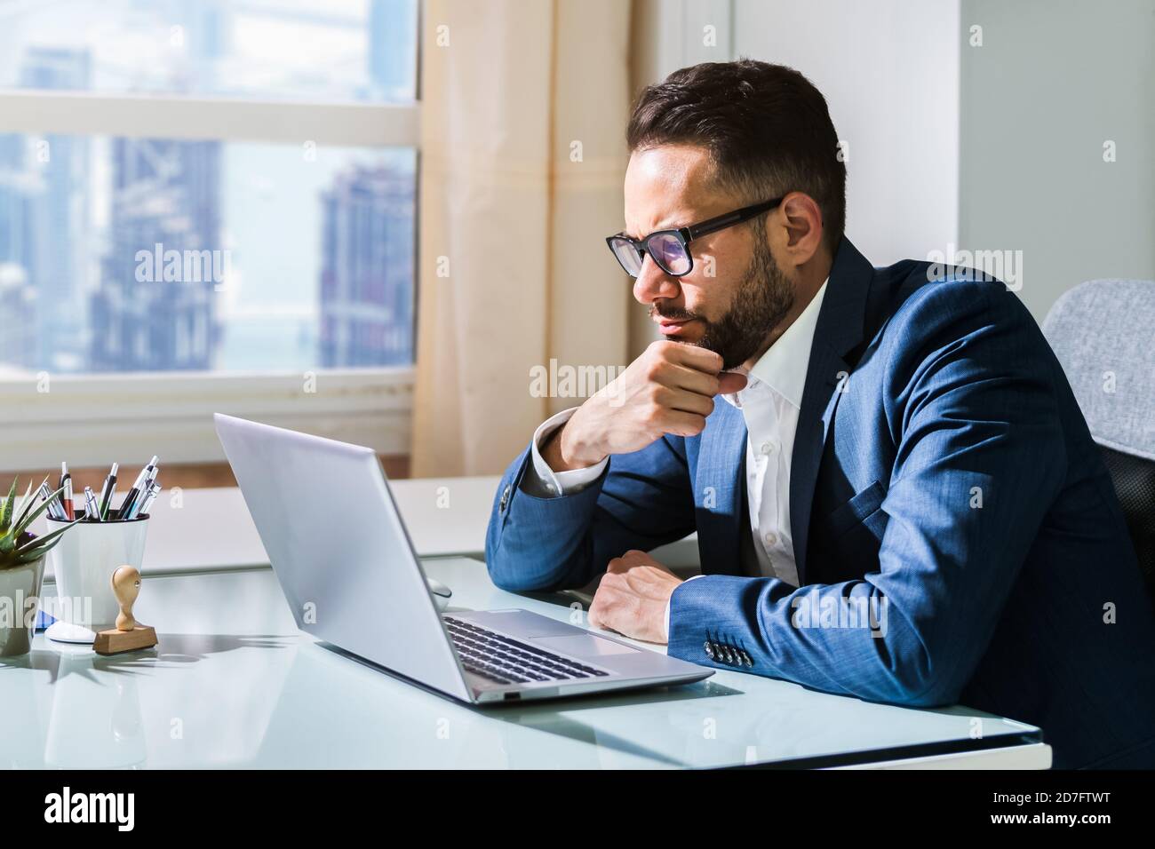 Pondering Thinking Businessman Using Office Computer. Contemplative Man ...