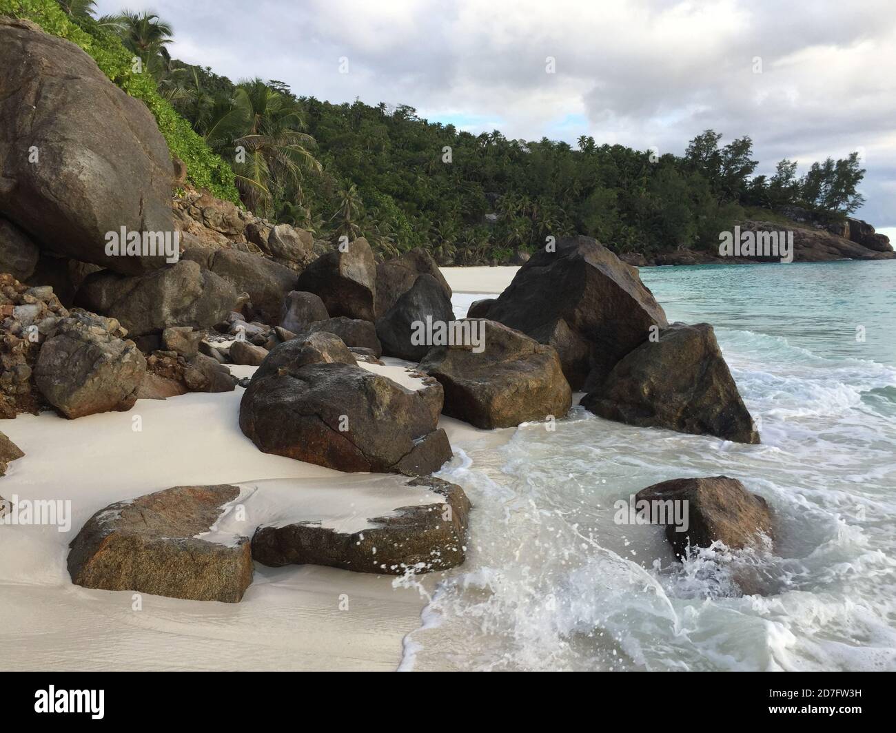 Sunny day in a Desert Beach in Seychelles Stock Photo - Alamy