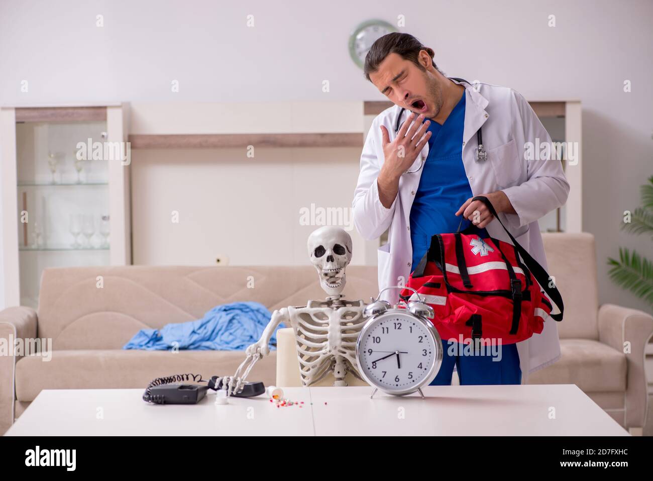 Male paramedic visiting skeleton patient Stock Photo - Alamy