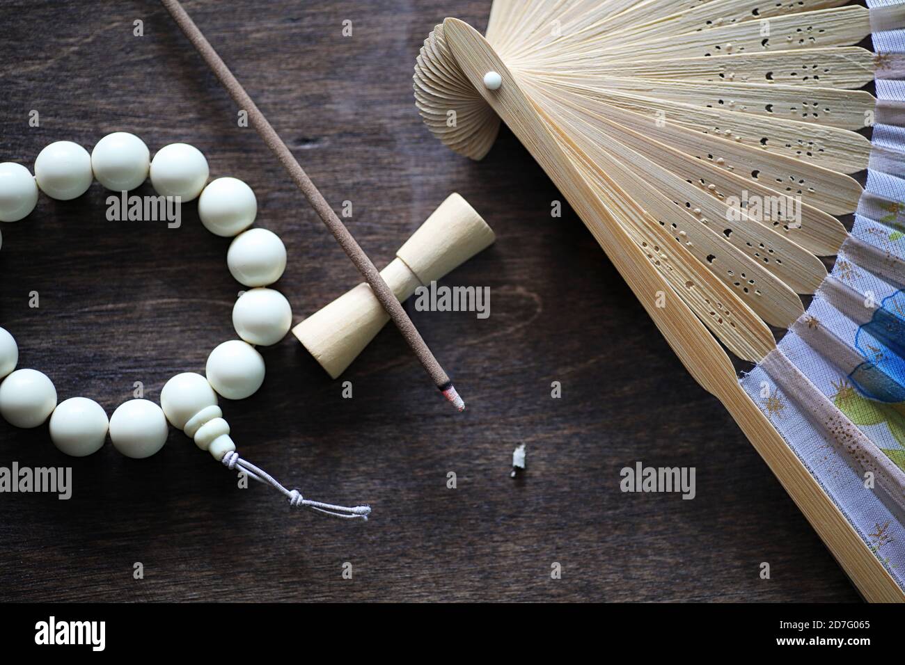 Different objects with traditional religious oriental on a wooden ...