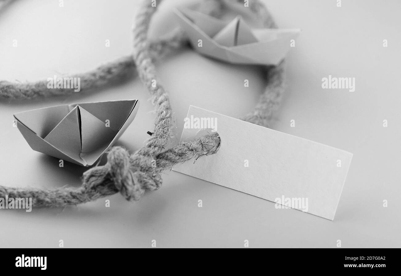 white sticker with thick braided rope and ship paper origami Stock ...