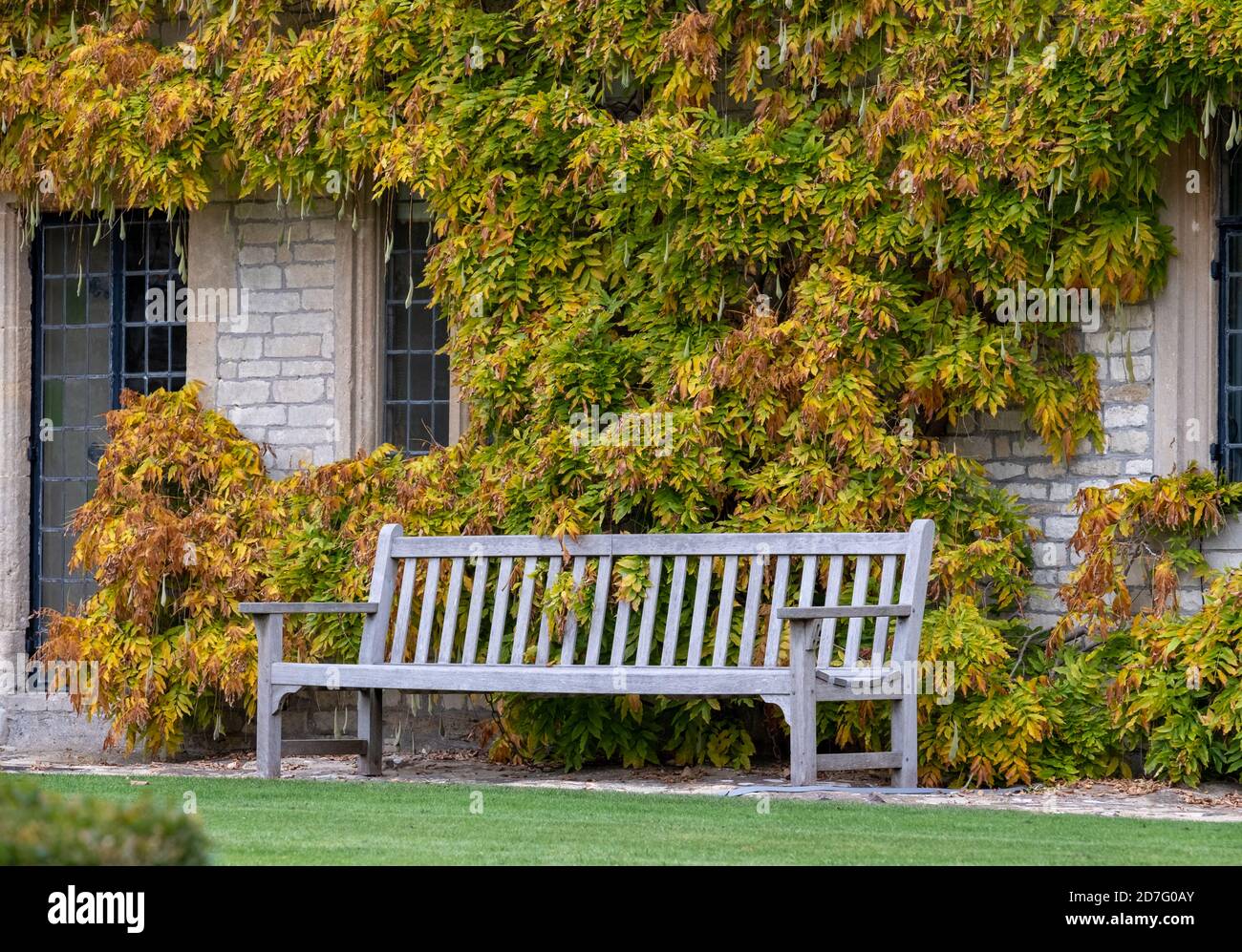 Sandstone house with bench in garden, in the pretty village of ...