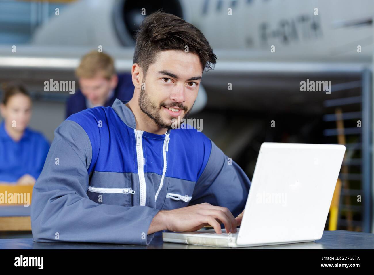 a male worker is computer diagnosing Stock Photo - Alamy