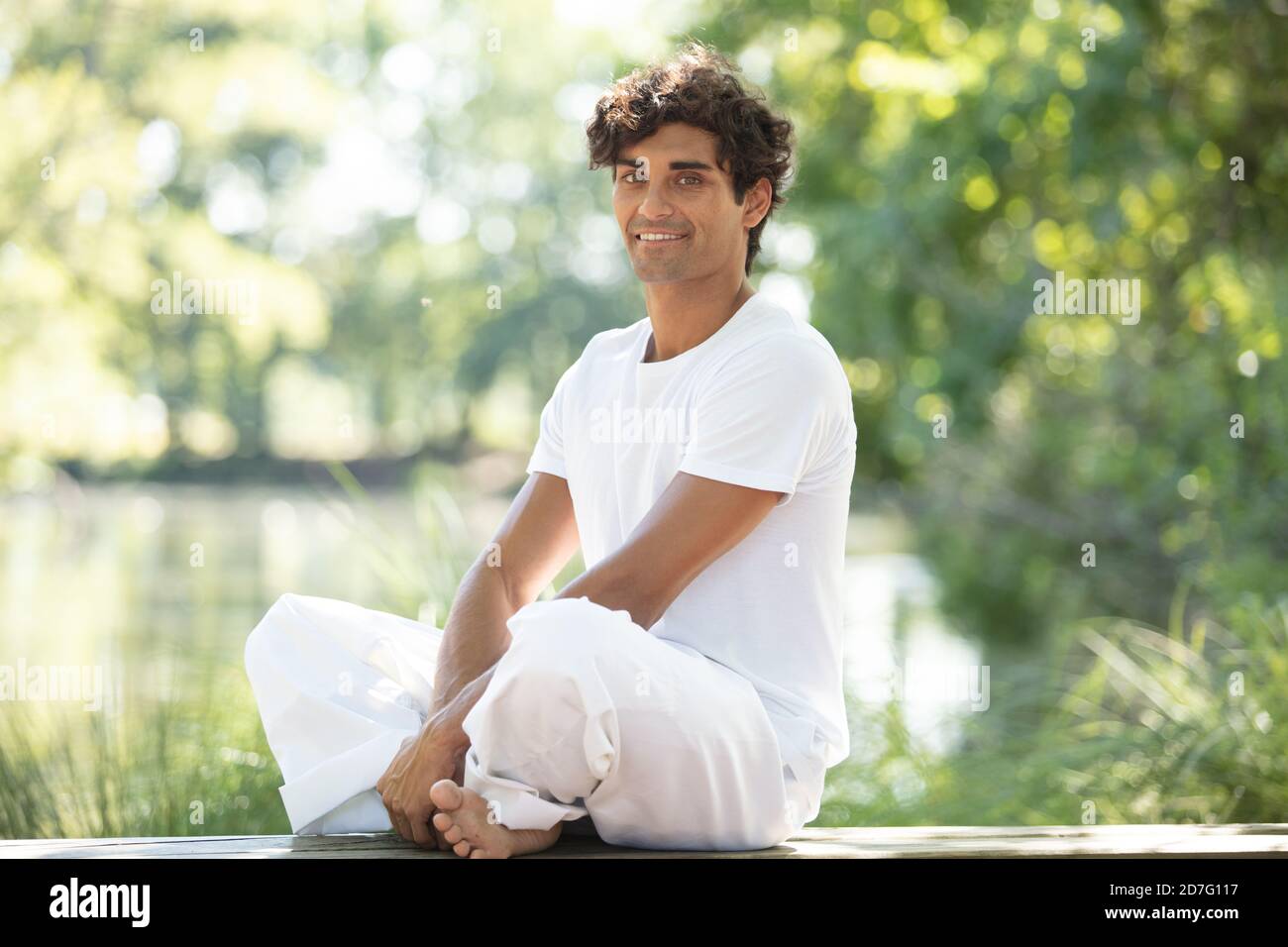 One green human meditating hi-res stock photography and images - Alamy