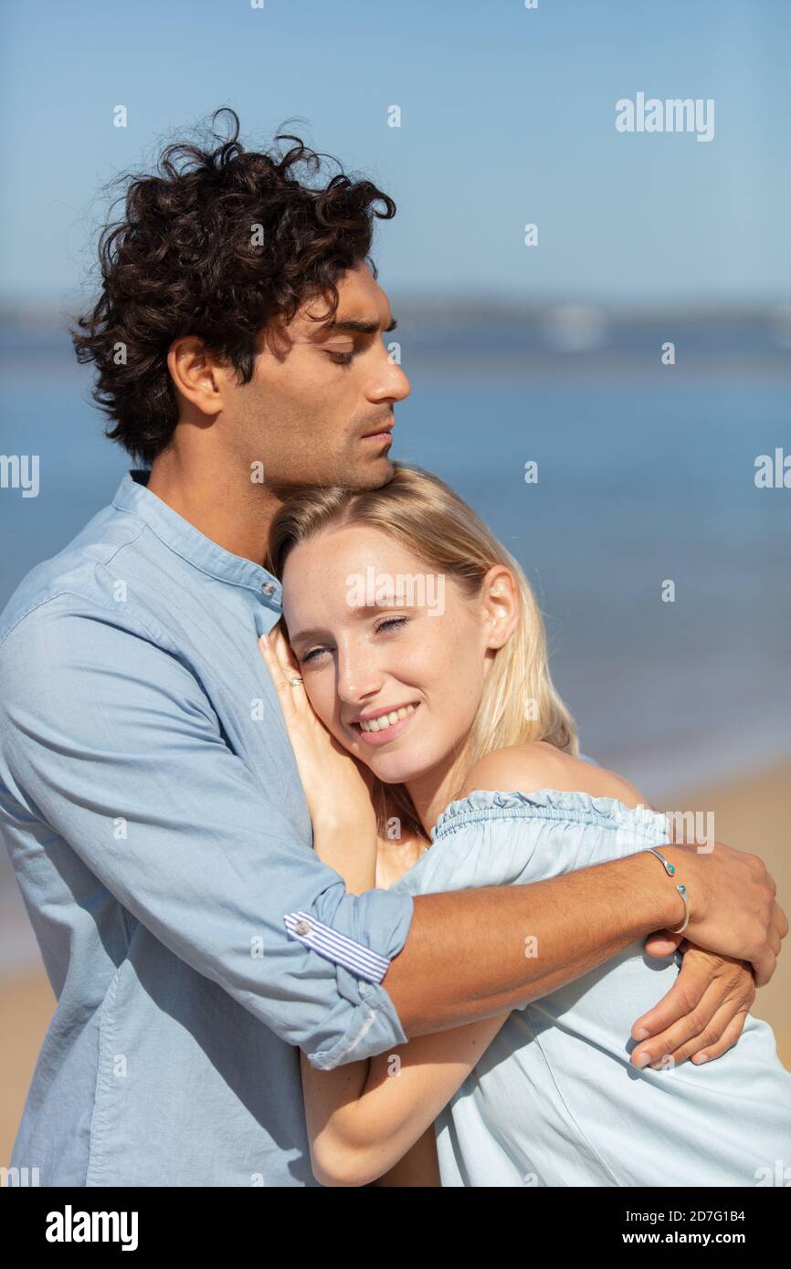 Adults whispering into ear hi-res stock photography and images - Alamy