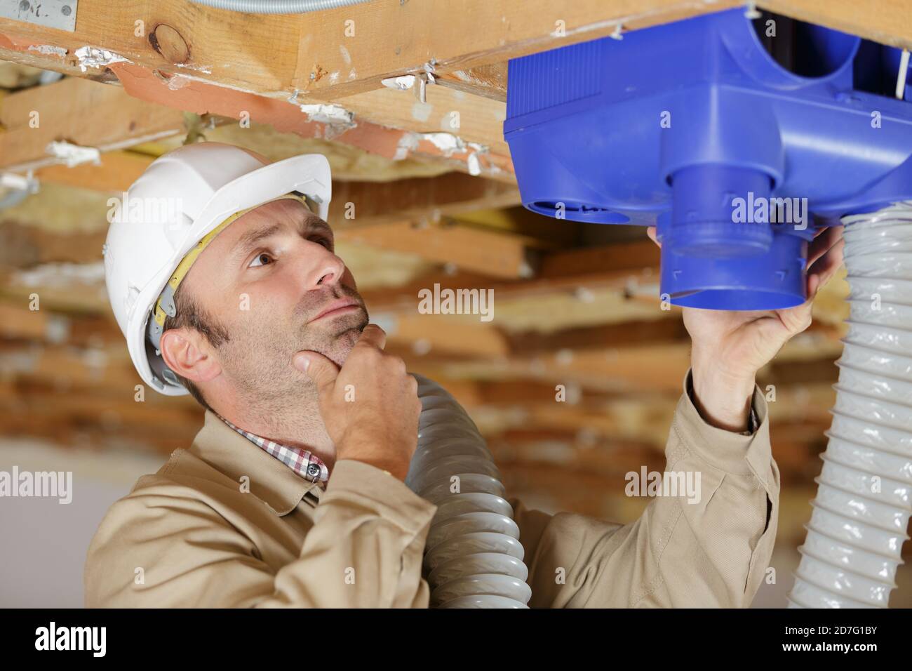 a carpenter on building site Stock Photo - Alamy