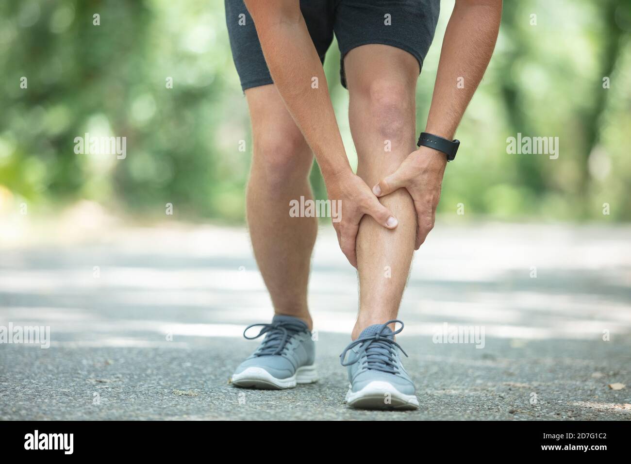 muscle injury man with sprain thigh muscles Stock Photo - Alamy