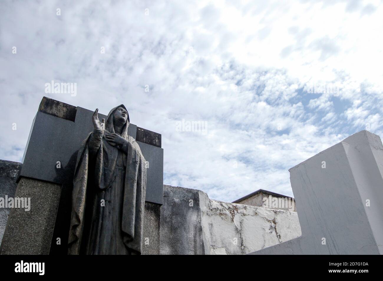 indoor scene of a cemetery showing several graves Stock Photo - Alamy