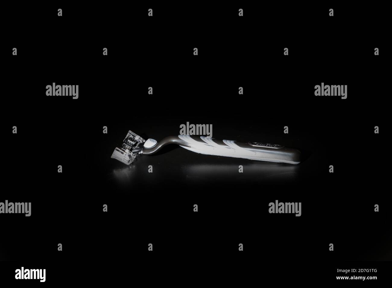 Gillette Mach 3 razor on black background in low key light Stock Photo ...