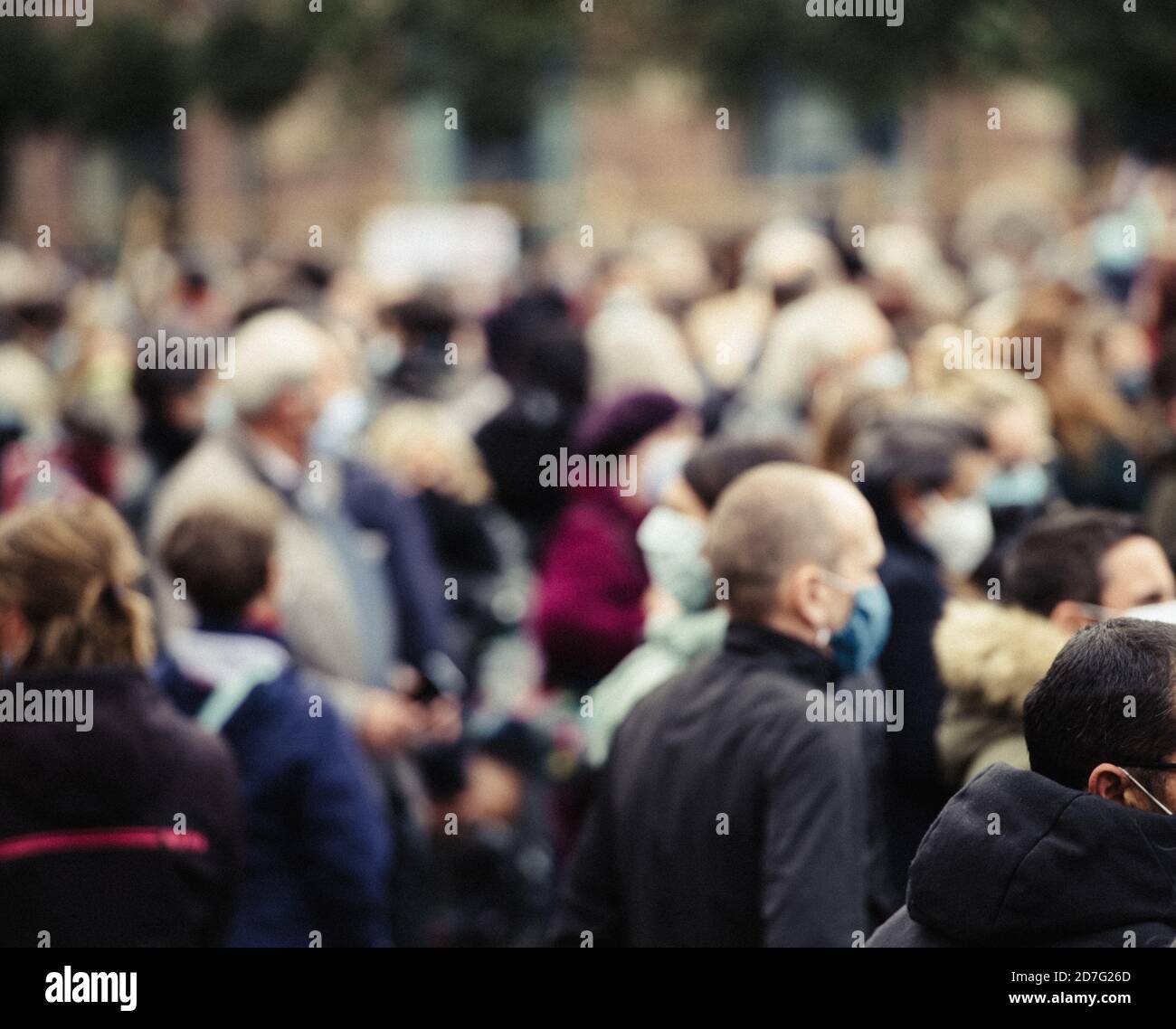 Large crowd of people with mask in central square of a French city ...