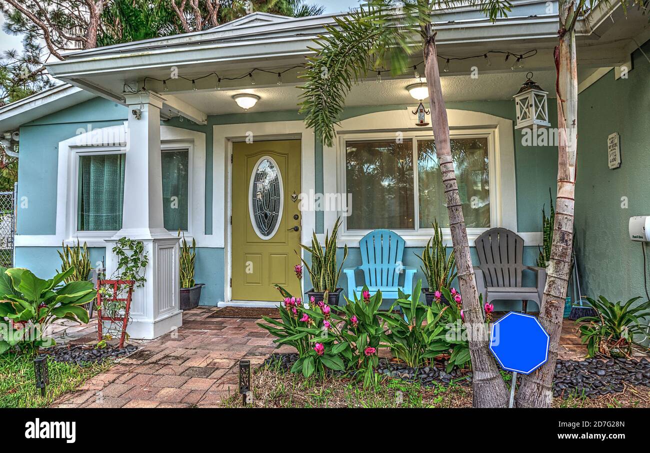 Blue and green beach bungalow porch in tropical Naples, Florida Stock ...