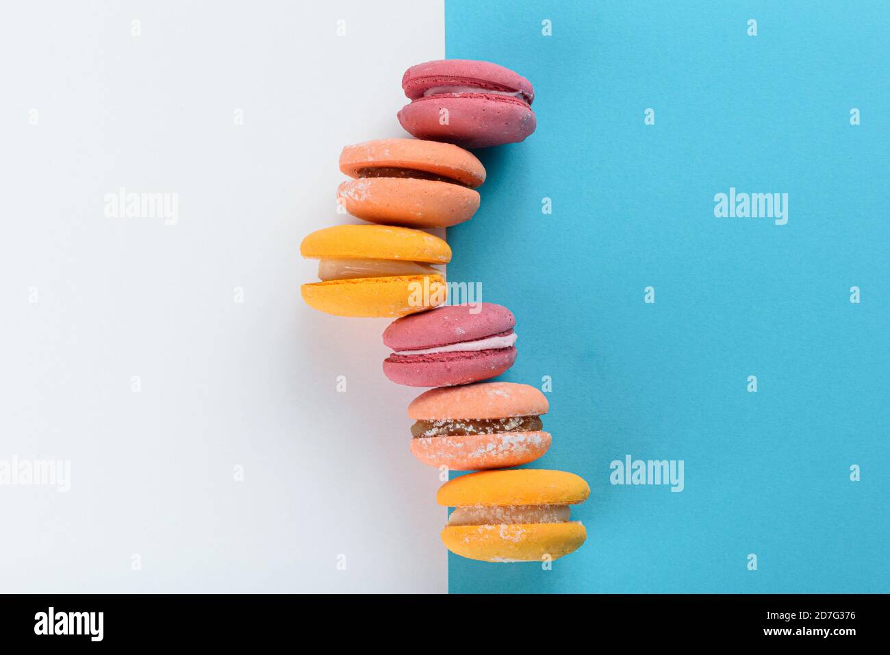 Colorful macaroons lined up in a winding curve Stock Photo - Alamy
