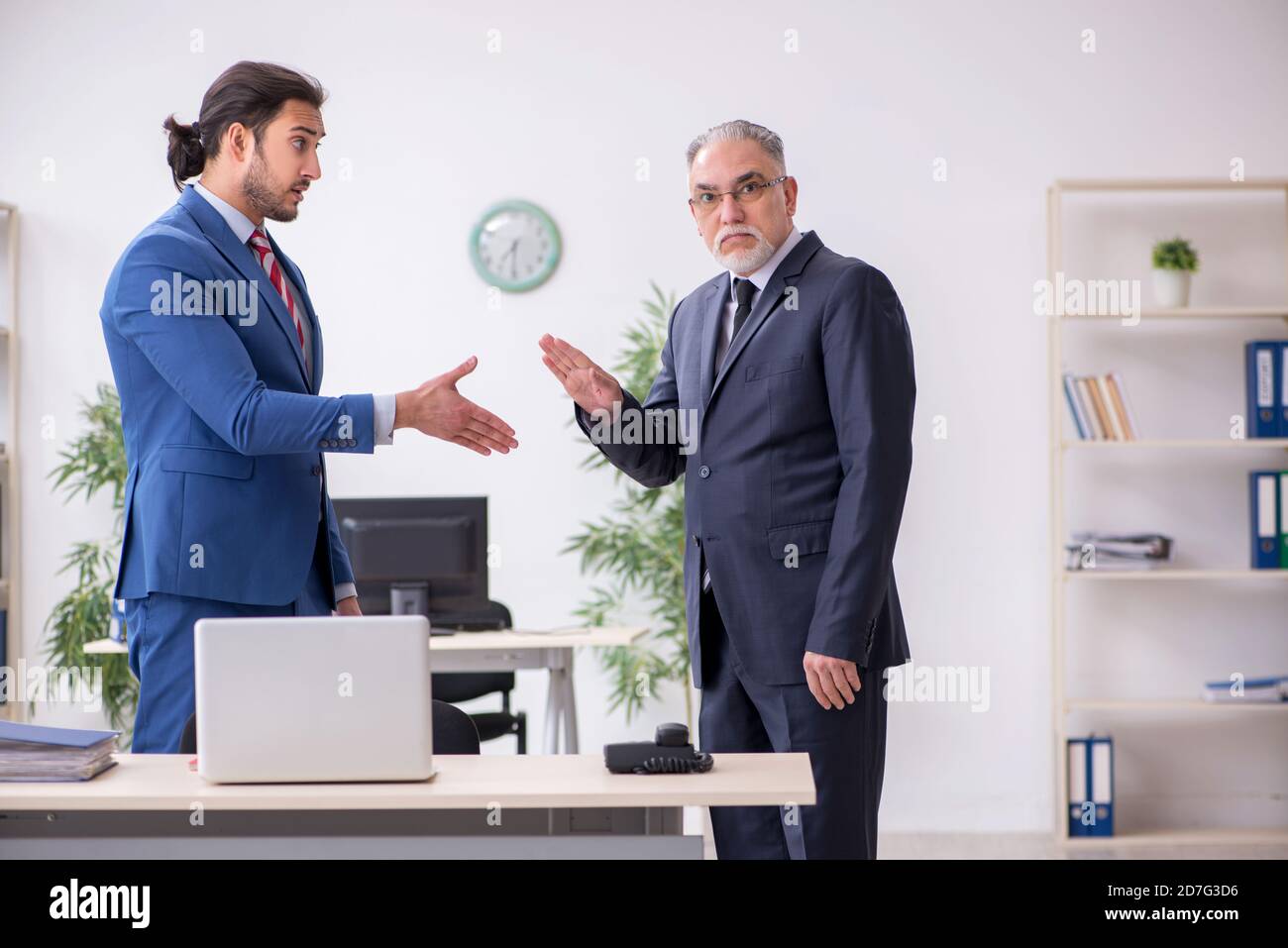 Employees at workplace during pandemic Stock Photo - Alamy