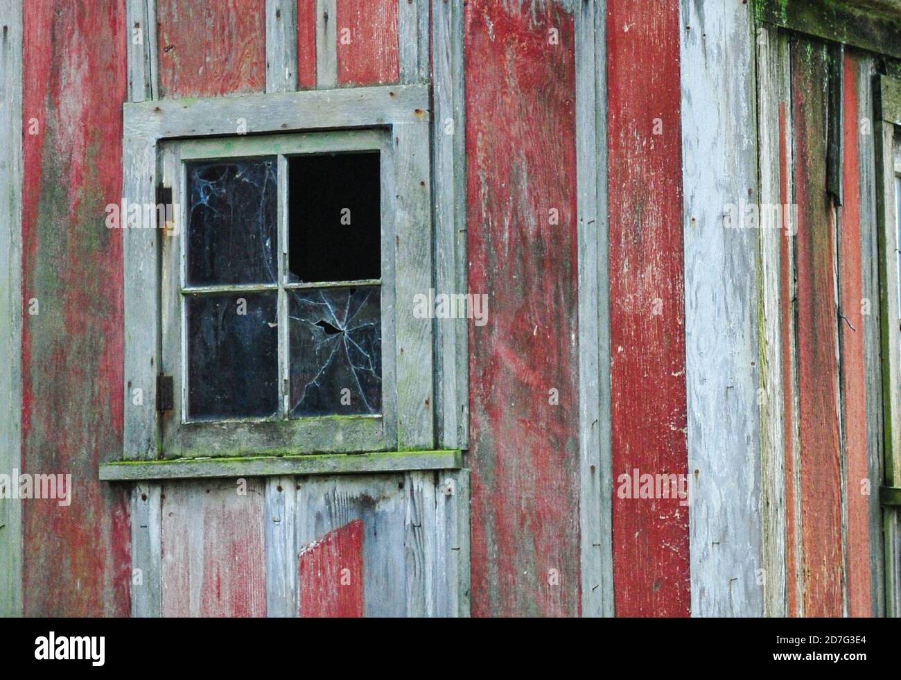 Old weathered red barn wall with a broken window Stock Photo - Alamy