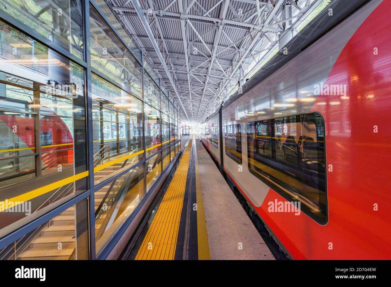 Passenger train stands by the platform before departure Stock Photo - Alamy