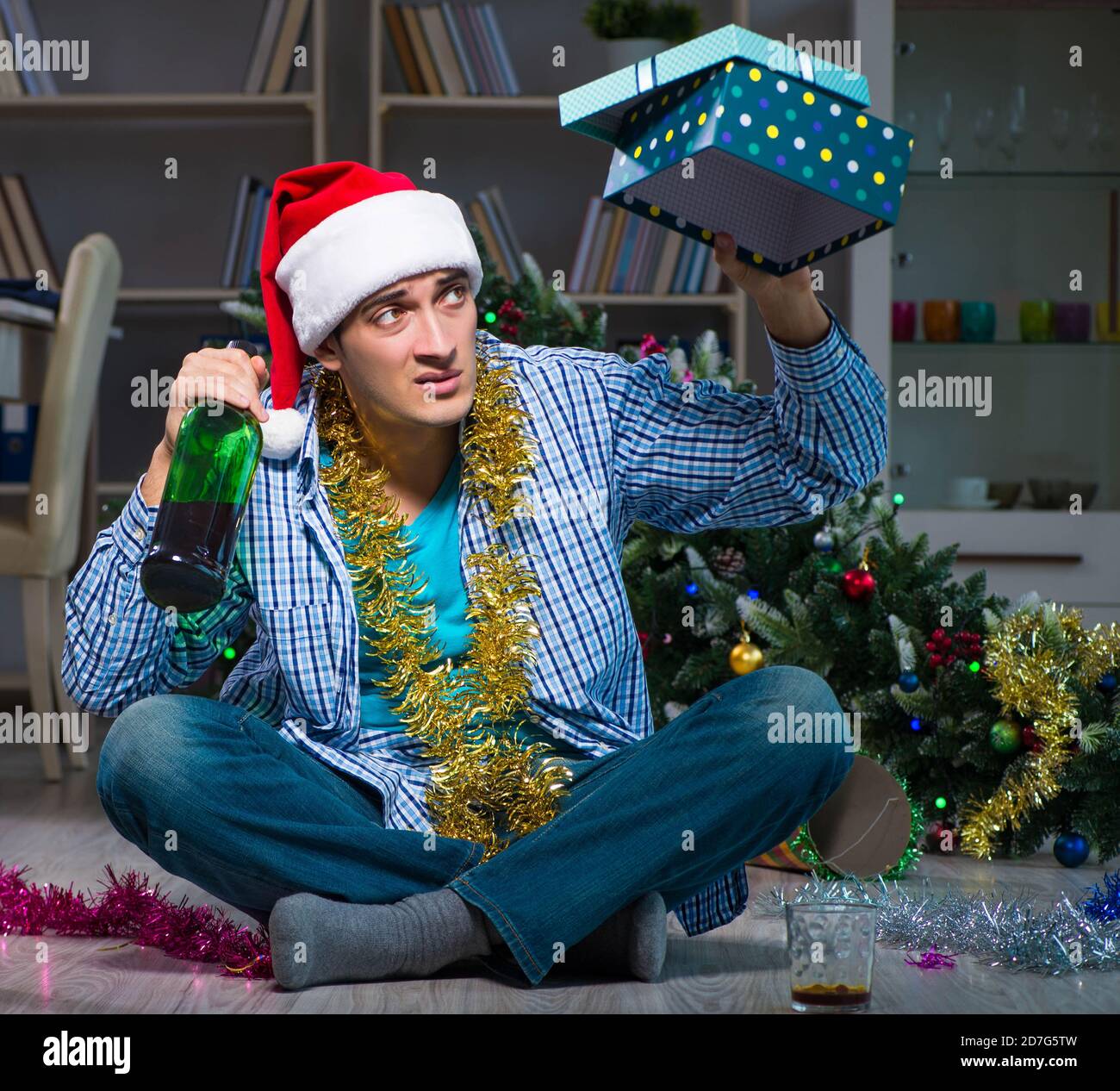The man celebrating christmas at home alone Stock Photo - Alamy