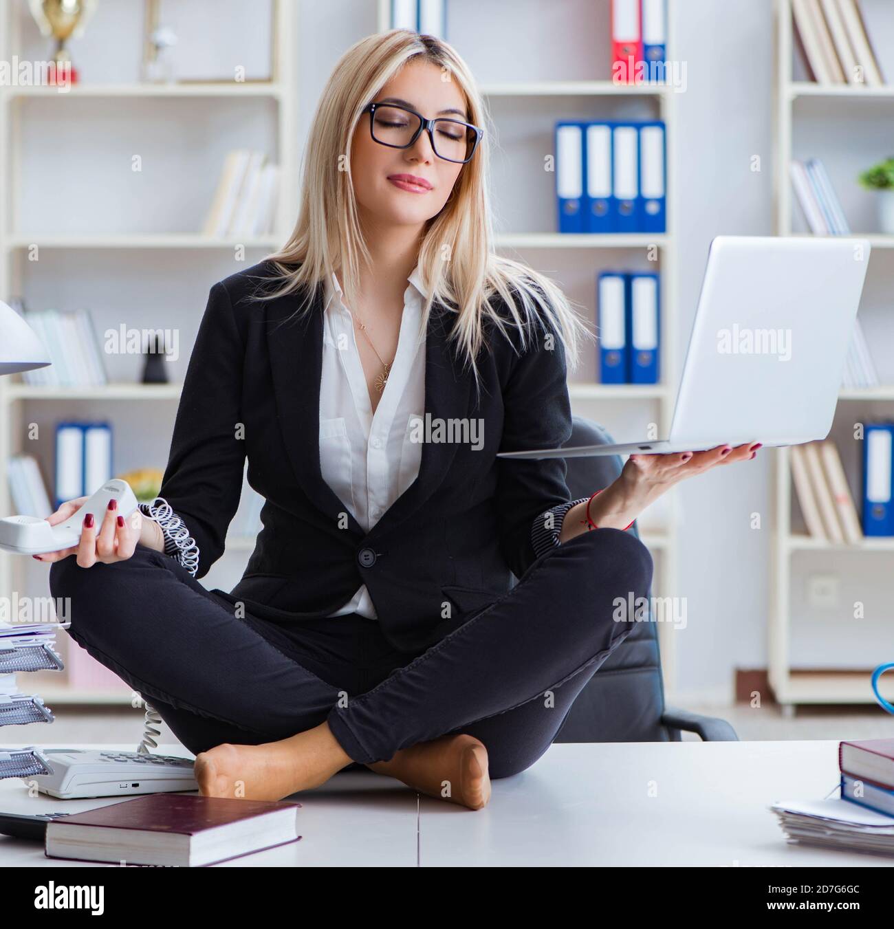 Tired woman meditating call center hi-res stock photography and images ...