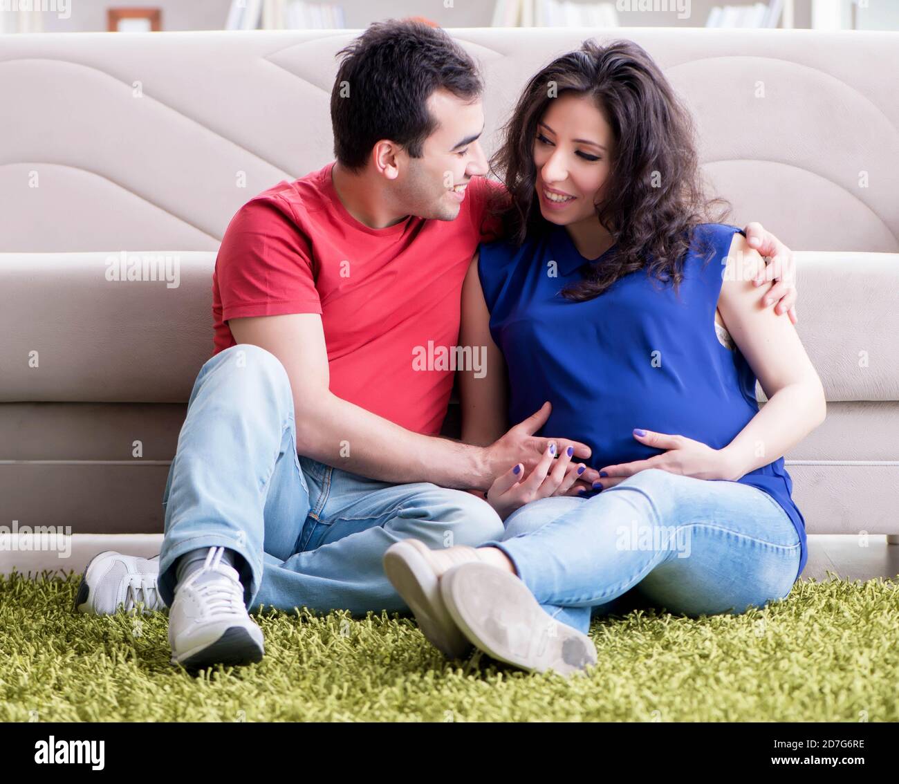 The young couple family expecting a baby Stock Photo - Alamy