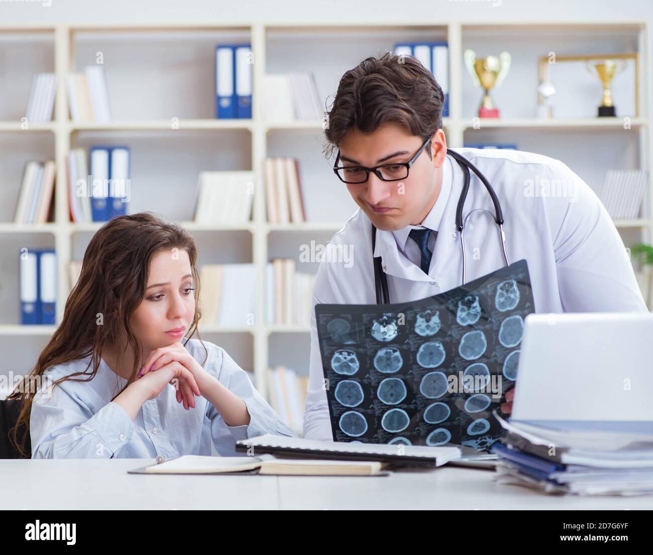 The doctor feeling pessimistic about x-ray image of patient Stock Photo ...