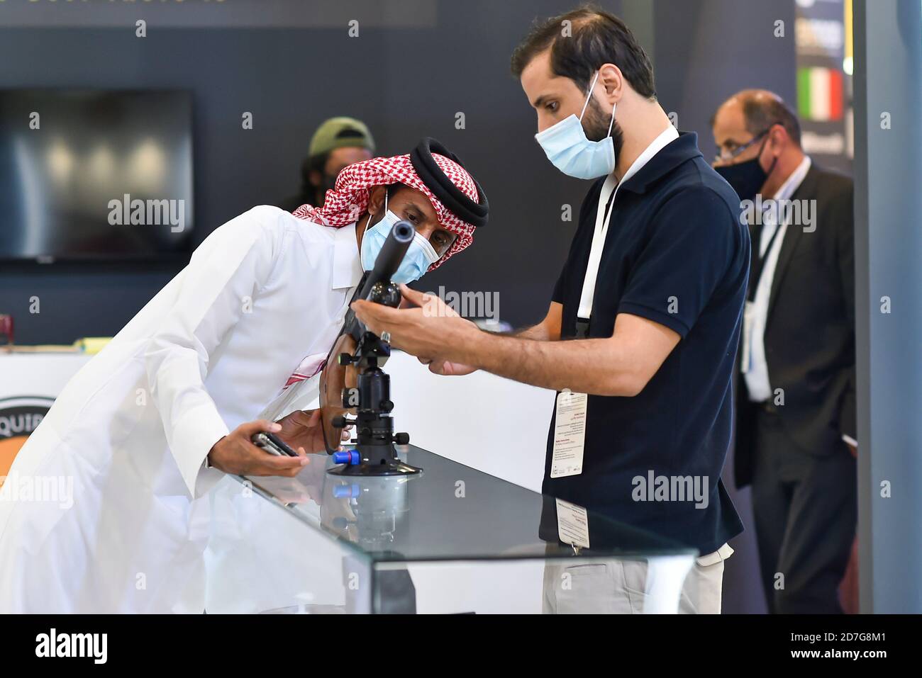 Doha, Qatar. 22nd Oct, 2020. People check a hunting rifle in the guns ...