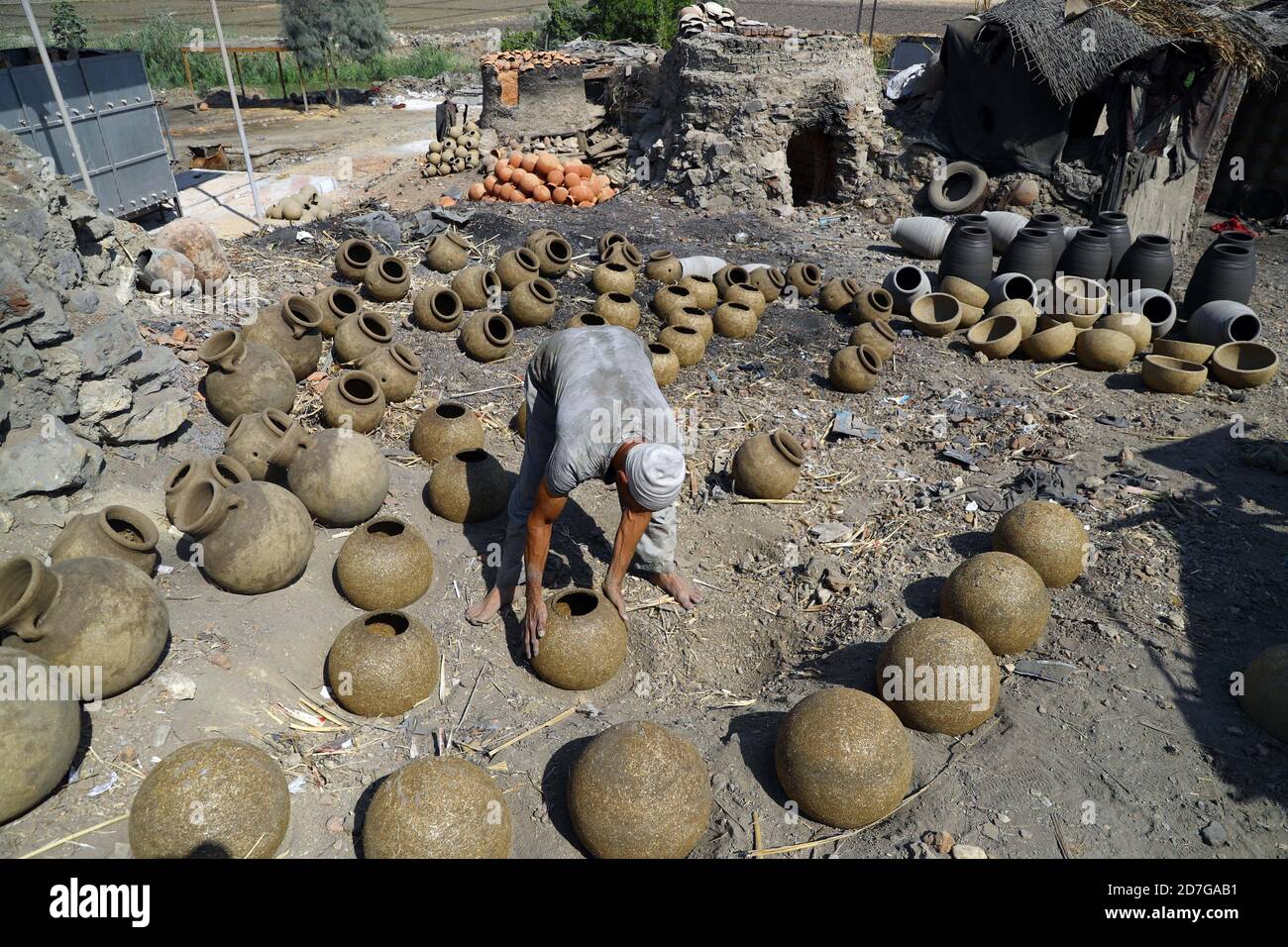 Fayoum, Egypt. 5th Oct, 2020. A potter works in Nazla village in Fayoum ...