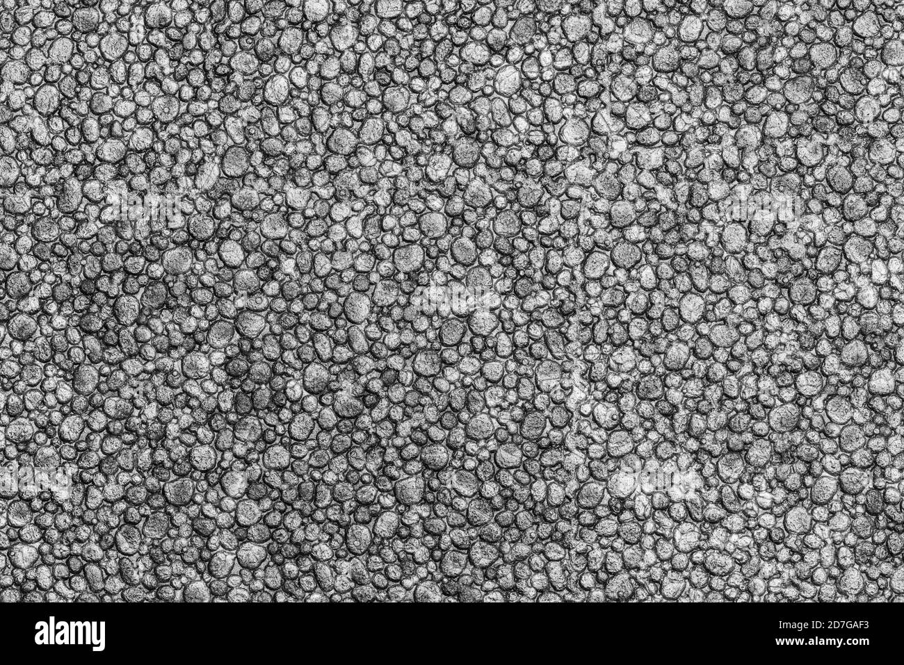 Black color styrofoam texture background. Close-up macro view of ...