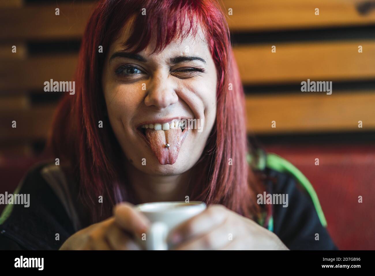 Woman and drinking tea and funny face hi-res stock photography and ...