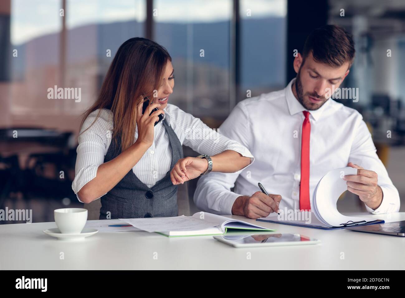 Business conflict. Business people arguing about document at the office ...