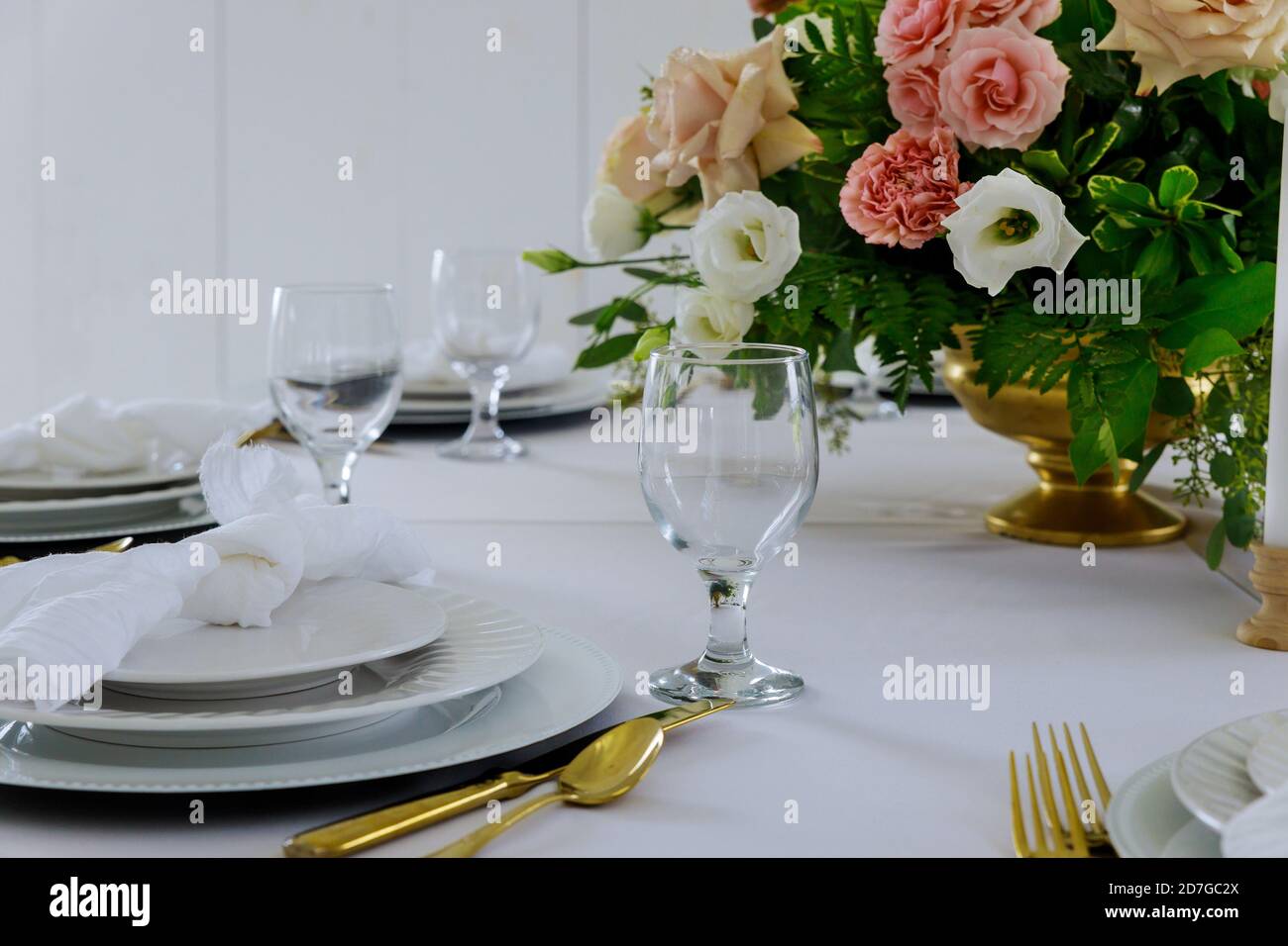 Table setting with beautiful flowers on the table in restaurant Stock ...