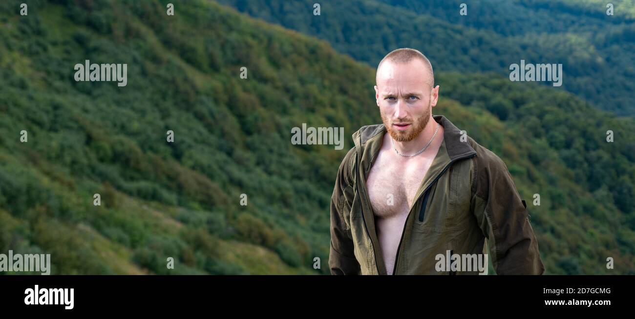 Hunting Clothing for hunter. Handsome confident man. Serious guy posing ...